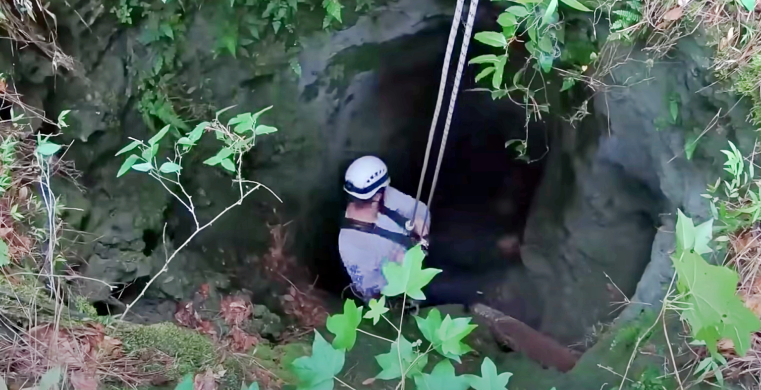 Man Hurries To Pull Dog Out Of Cave Before Storm Hits But Fails ...